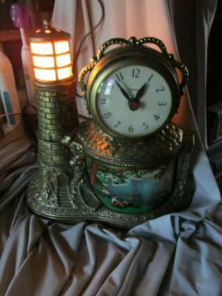 Vintage United Clock Corp Brass Tone Lighthouse Clock | #16456408